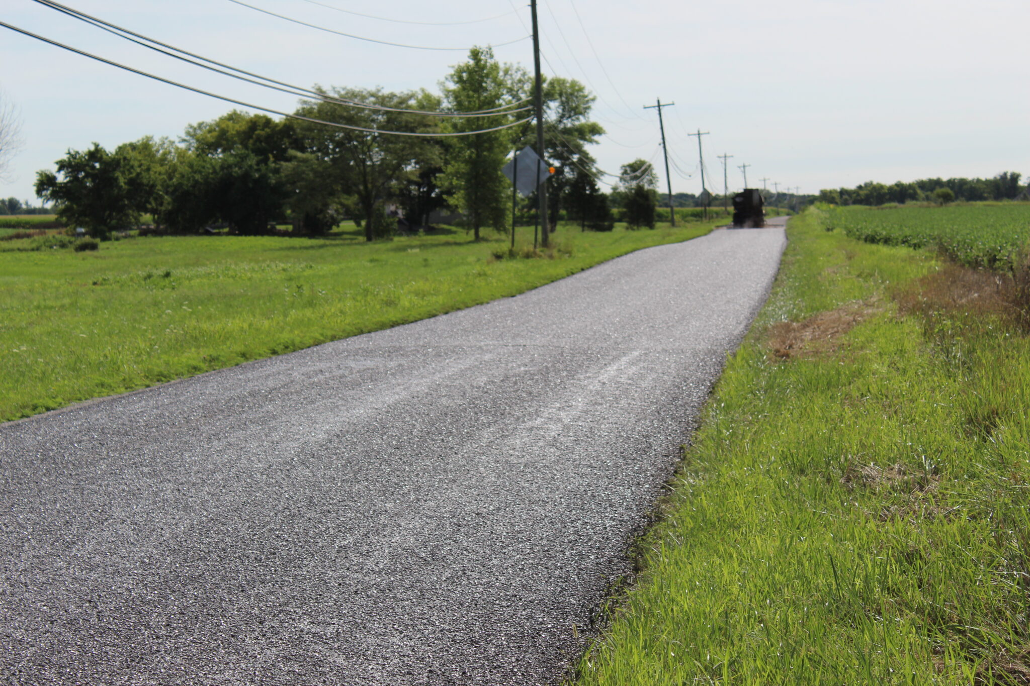 Fog Seal Treatments Can Enhance Safety - Asphalt Materials, Inc.