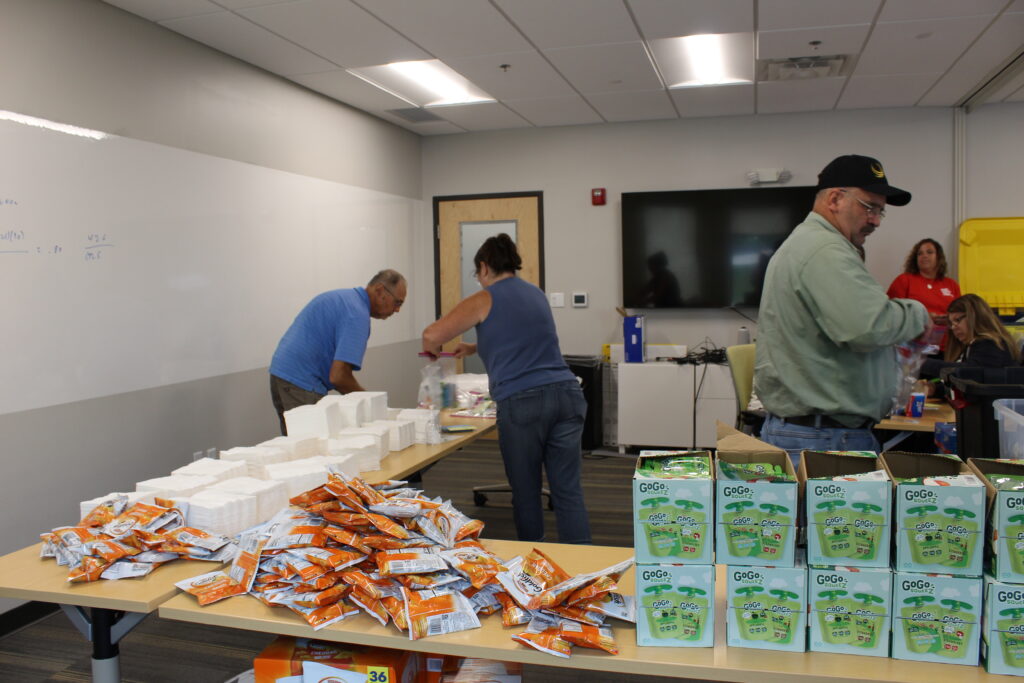 TEAM AMI Builds 1000 Kits to Help Indianapolis Hunger Relief Efforts ...